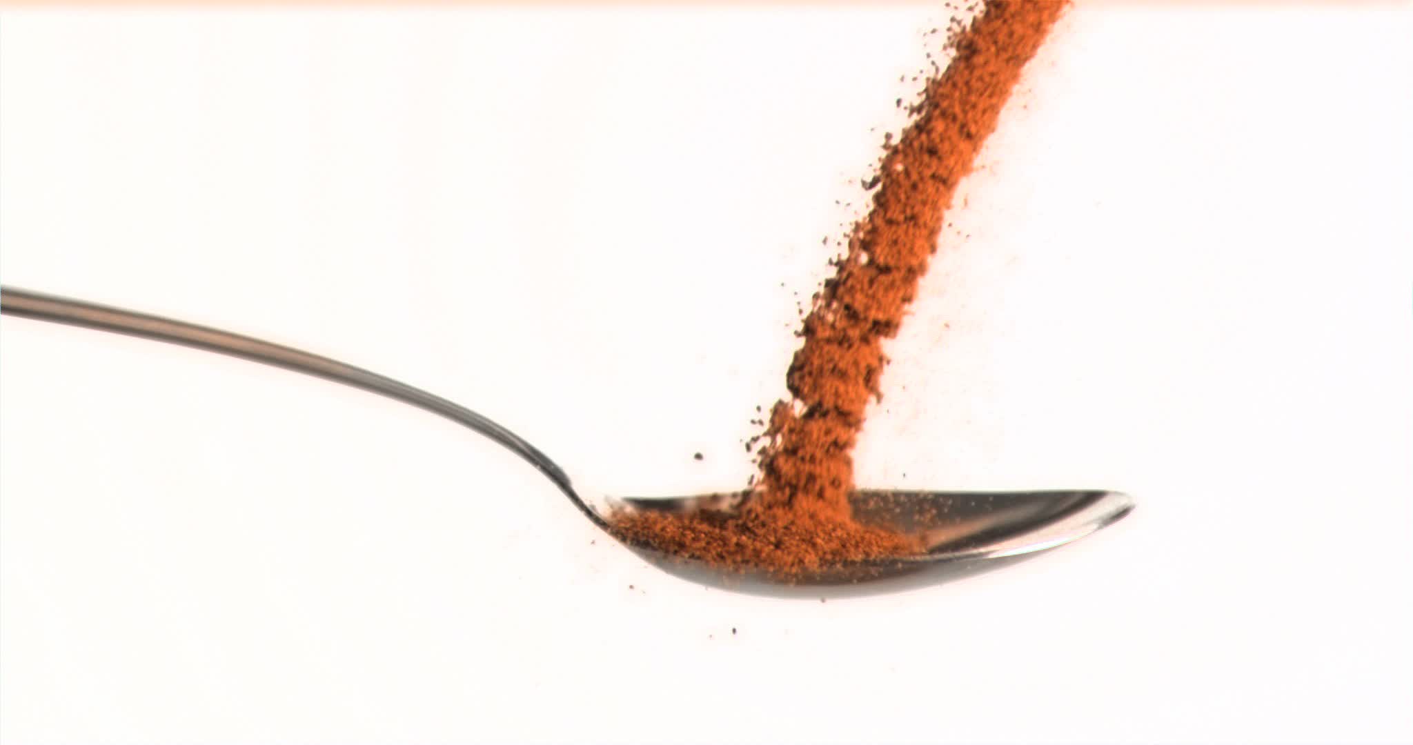 Brown Powder Poured In Super Slow Motion In A Spoon Stock Video ...